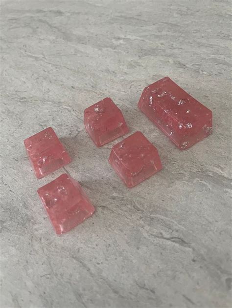 sakura sparkle keycaps set backspace and arrow keys paw print design