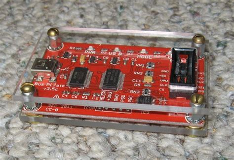 machined acrylic case for the bus pirate dangerous prototypes