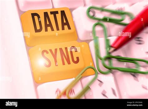 Hand Writing Sign Data Sync Word Written On Data That Is Continuously