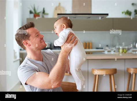 Baby Father Lifting Babe Babies Human Babies Dad Fathers Stock