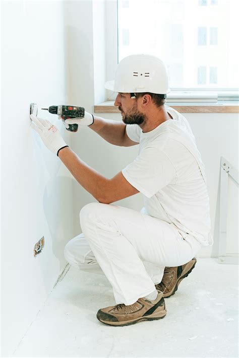 Worker Installing Air Conditioner Photos Download The Best Free Worker