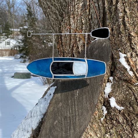 Paddle Board 2 Stained Glass Suncatcher Hanging From Silver Steel