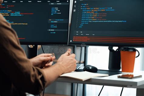 it developer working online software development coding on pc screens
