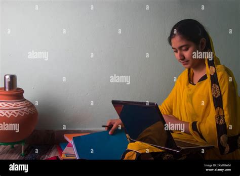 Rural Teenage Girl Babe Taking Notes During Online Class On Laptop Stock Photo Alamy