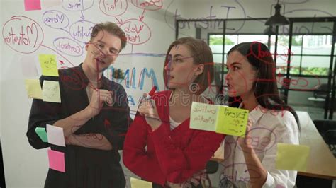Business Team Brainstorming Idea By Using Colorful Sticky Note