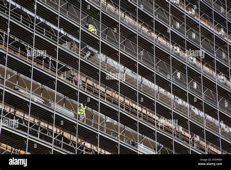 The Abstract Grid Of Scaffolding On A Building Under Construction In The Porta Nuova Business