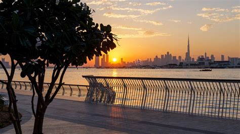 Panoramic Sunset View Of Dubai Downtown Skyline And Dubai Creek Canal