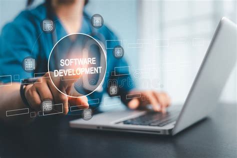Developer Touching Software Development Interface Working On Laptop