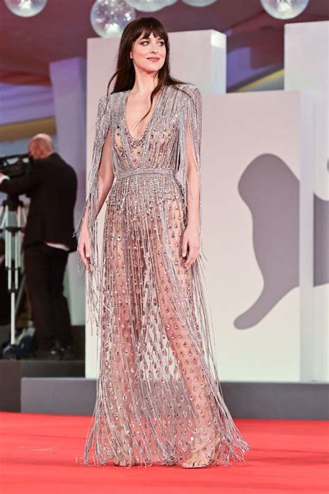 Dakota Johnson Wows On Red Carpet In Jaw Dropping Sheer Fringed Silver
