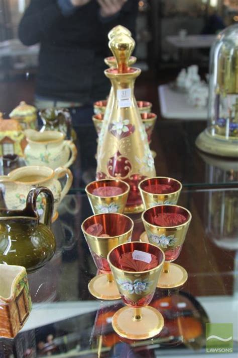 Lot Continental Ruby And Gilt Part Drinks Suite