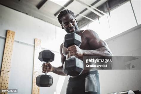 Dumbbell Concentration Curl Photos And Premium High Res Pictures Getty Images