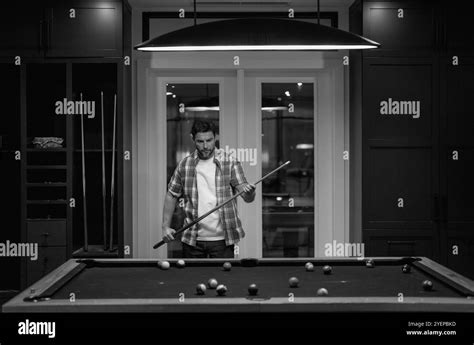 Man Playing The Billiards Man Play American Billiard In Billiard Room