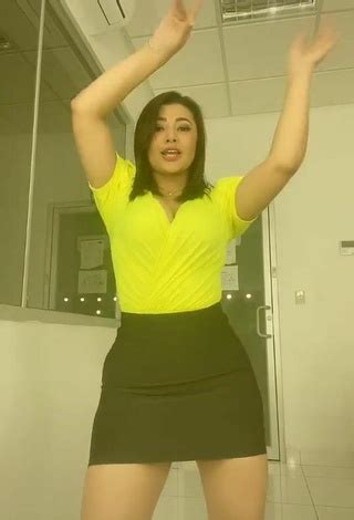 Sweetie Milagro Flores Shows Cleavage In Yellow Top Sexyfilter Com