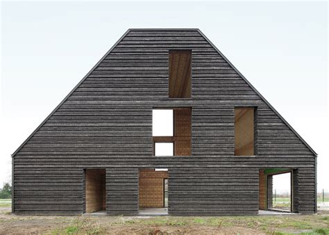 Ribbed Brickwork Covers The Facade Of This House In Belgium