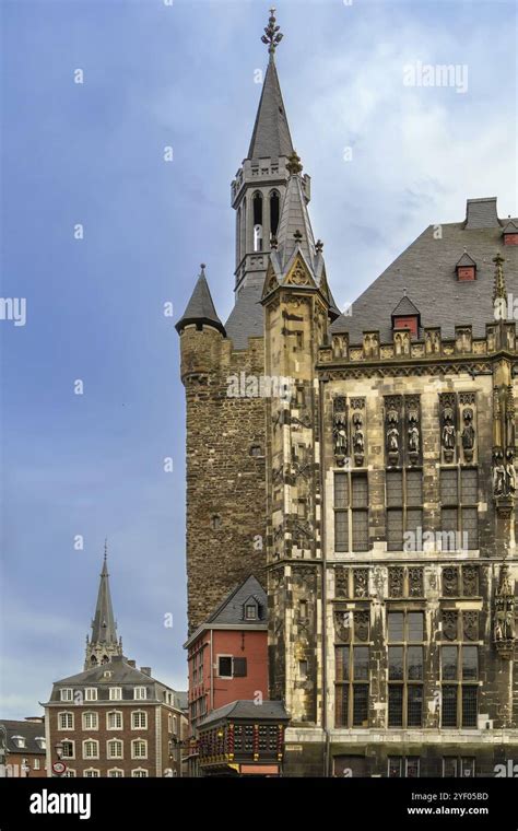 The Gothic Aachen Rathaus, or Aachen City Hall, lies next to the Aachen Cathedral and is one of ...