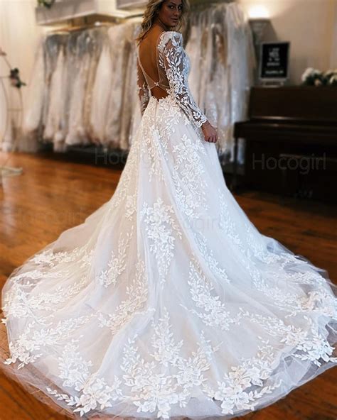 Shop Deep V Neck White Lace A Line Wedding Dress With Long Sleeves From