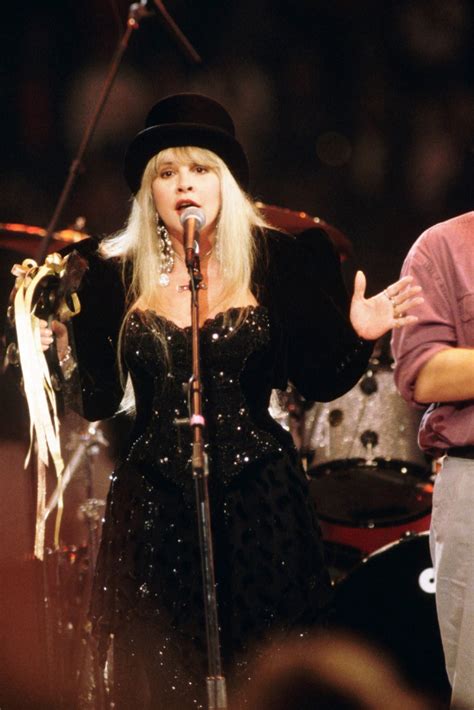 24 Candid Photographs Of Stevie Nicks On Stage With Her Trademark Top