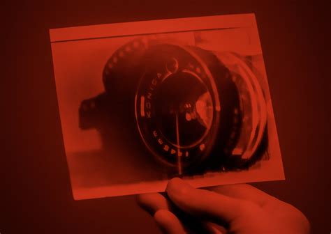 analog darkroom printing with an enlarger in solutions ng art labs