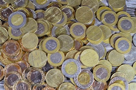 various saudi arabia kingdom coins of different values and times old