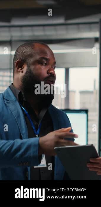 Vertical Video Businessmen Analysts Monitoring Efficiency Insights At