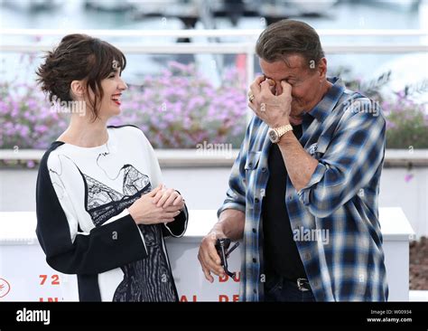 Paz Vega And Sylvester Stallone Arrive At A Photocall For The Film