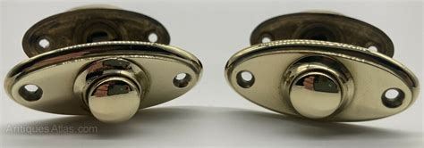 Antiques Atlas A Pair Of Edwardian Oval Brass Cupboard Knobs As1242a056