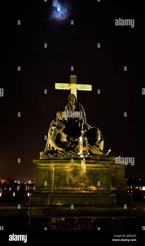 A Night View Of The Statue Of A Virgin Mary With Jesus In Prague Czech