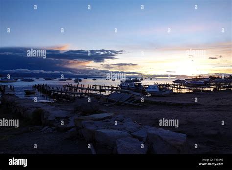 Colorful Sunset Above The Lake Titicaca From The Shore Side In