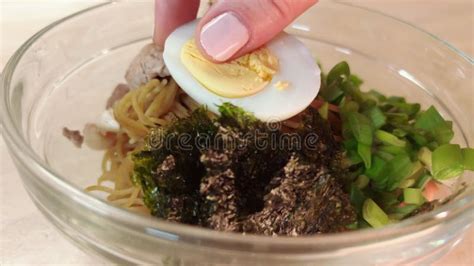 Pov Putting Boiled Egg On Top Of Ramen Soup Cooking Noodles With