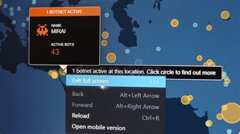 Criminal Hacker Using Computer Pointing To A World Map For Organizing Global Massive Data Breach