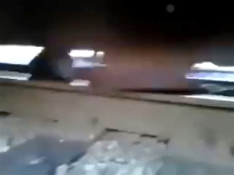 Guy Stuck Under Moving Train Escapes Between Its Rails R Thatsinsane