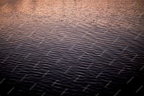 Premium Photo | Rippling water surface water river