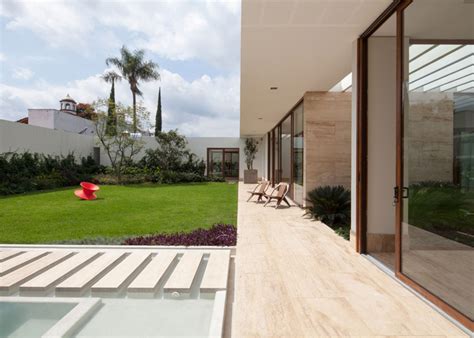 House Of Eight Gardens Is Built Around Open Air Courtyards