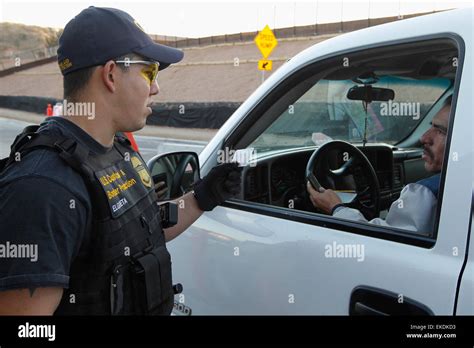 A Cbp Officer Checks Pedestrian Identification At The Mariposa Port Of