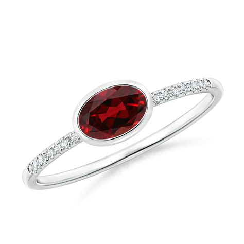 Vintage Style Oval Garnet Ring With Diamond Accents