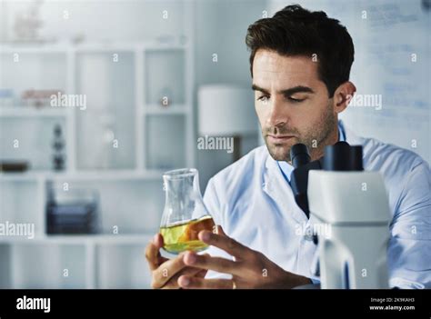 Lets Put This Theory To The Test A Scientist Conducting An Experiment