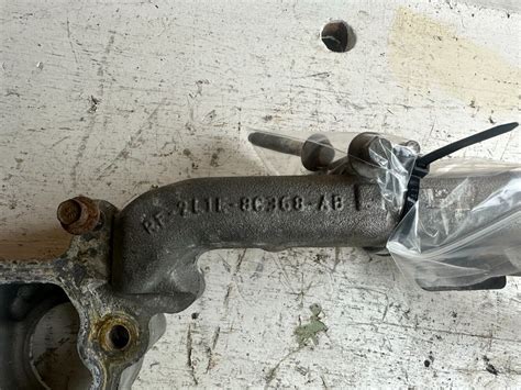 Ford Coolant Crossover W Bolts Pn Rf 2l1e 8c368 Ab Rf2l1e8c368ab