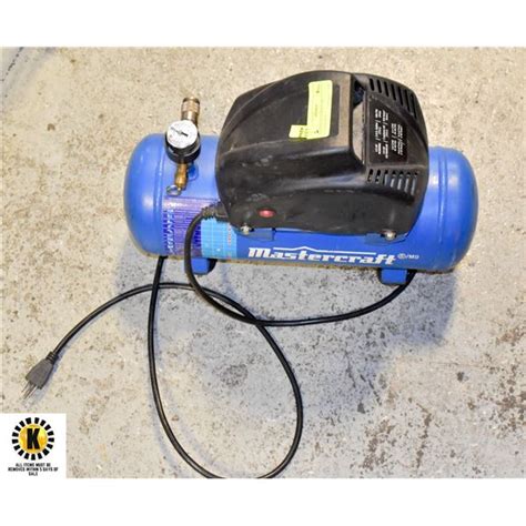 Mini Mastercraft Air Compressor