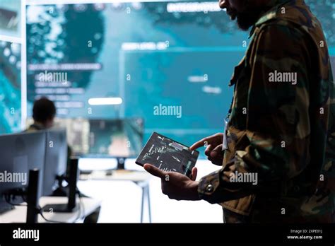 High Tech Military Office With Soldiers Analyzing Real Time Data