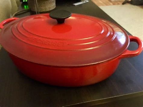 Le Creuset Enameled Cast Iron 6 34 Qt 31 Oval Dutch Oven Cherry Red