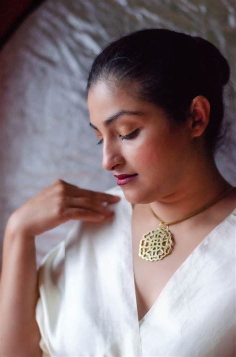 Genda Phool Brass Pendant Nakshthelabel