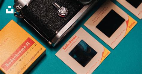 파란색 표면에 검은색 니콘 Dslr 카메라 사진 Unsplash의 무료 필름 사진 이미지