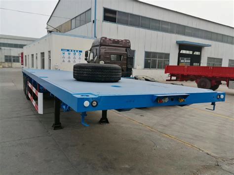 Heavy Duty Tandem Axle 20 Foot 40 Container Foot Flat Bed Truck Semi