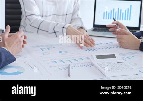 Business People Professionals In A Meeting Analyze Financial Reports