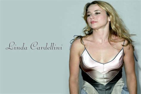 Download Elegant Linda Cardellini Posing At A Photoshoot Wallpaper