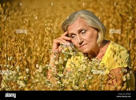 Portrait Of A Sad Senior Woman Stock Photo Alamy