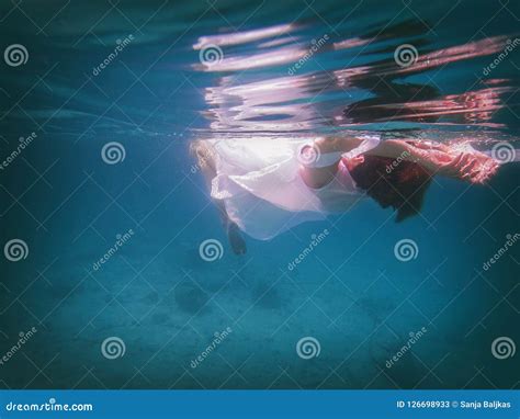 Partially Submerged Algae And Seaweed Covered Rocky Outcropping Stock Photo CartoonDealer Com