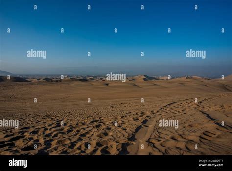 Sand Dunes In Desert Desert Area Desert With Blue Sky In Ica Peru Stock