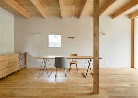 House In Mikage Contrasts White Surfaces With Exposed Wooden Beams