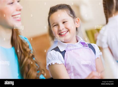 Cute Girl And Teacher Stock Photo Alamy